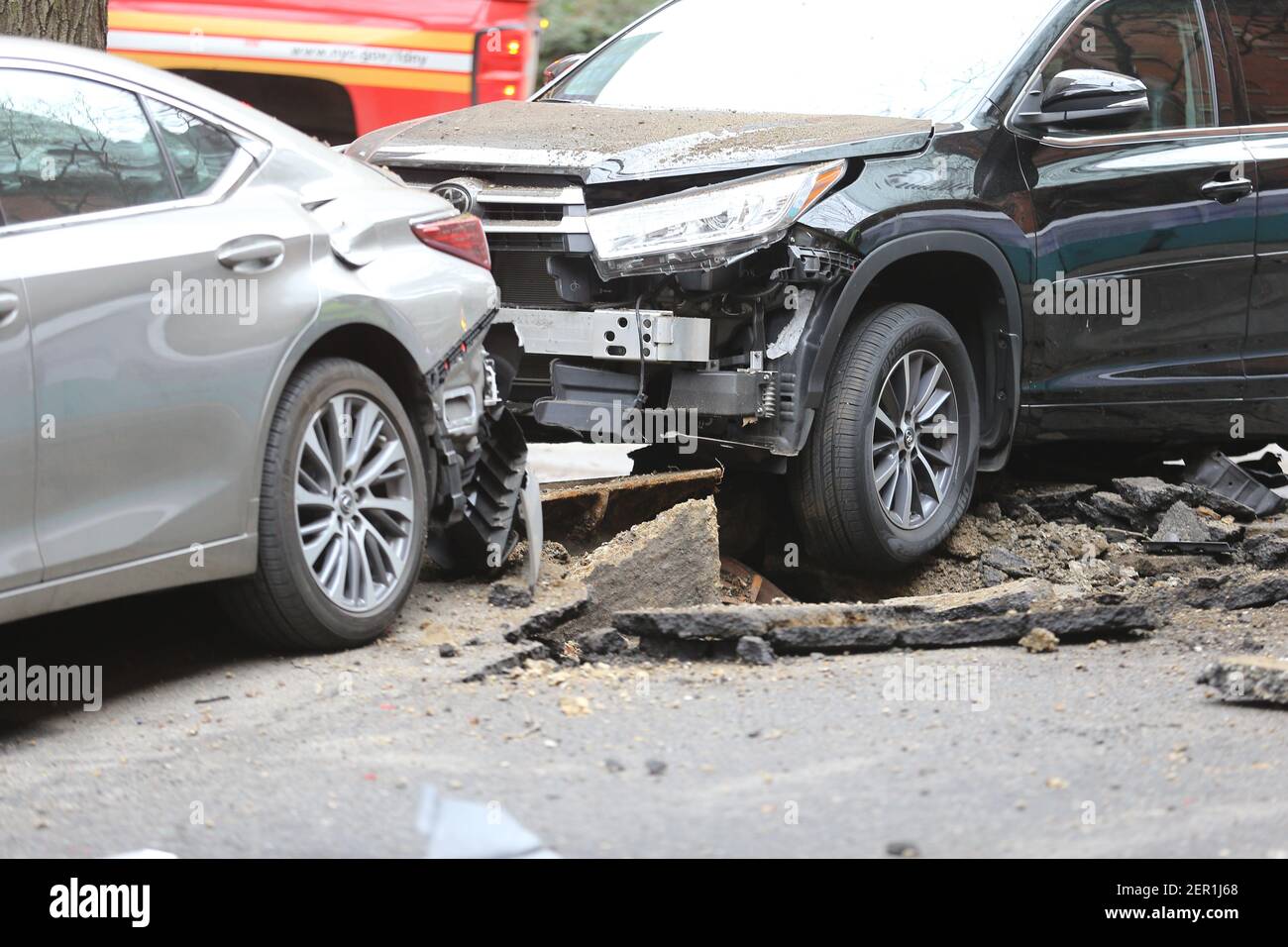 First responders and crowds gather at a manhole explosion in midtown ...