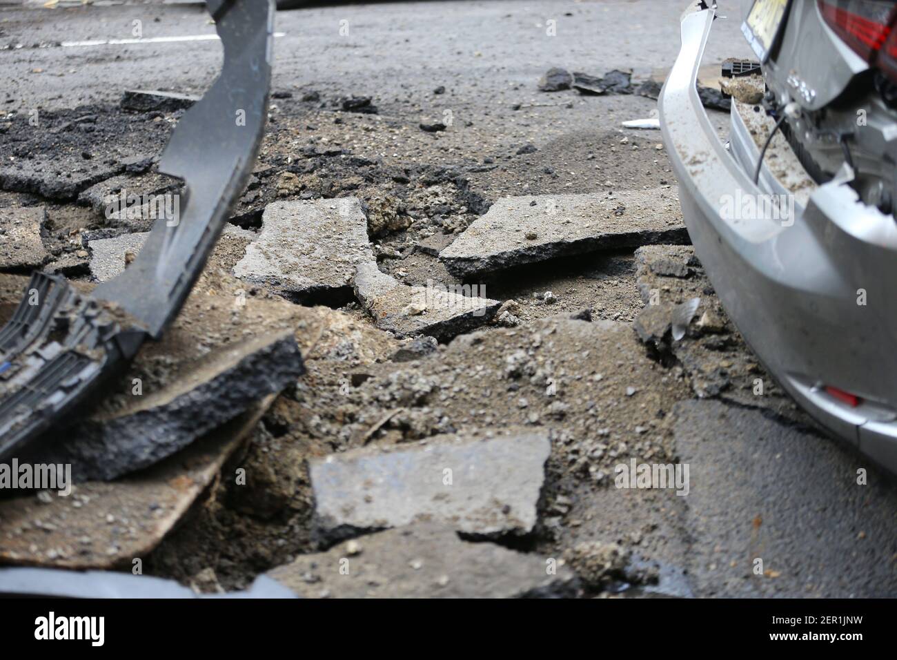First responders and crowds gather at a manhole explosion in midtown ...
