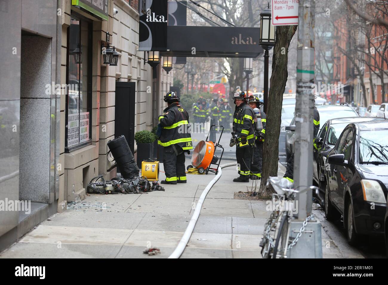 First responders and crowds gather at a manhole explosion in midtown ...