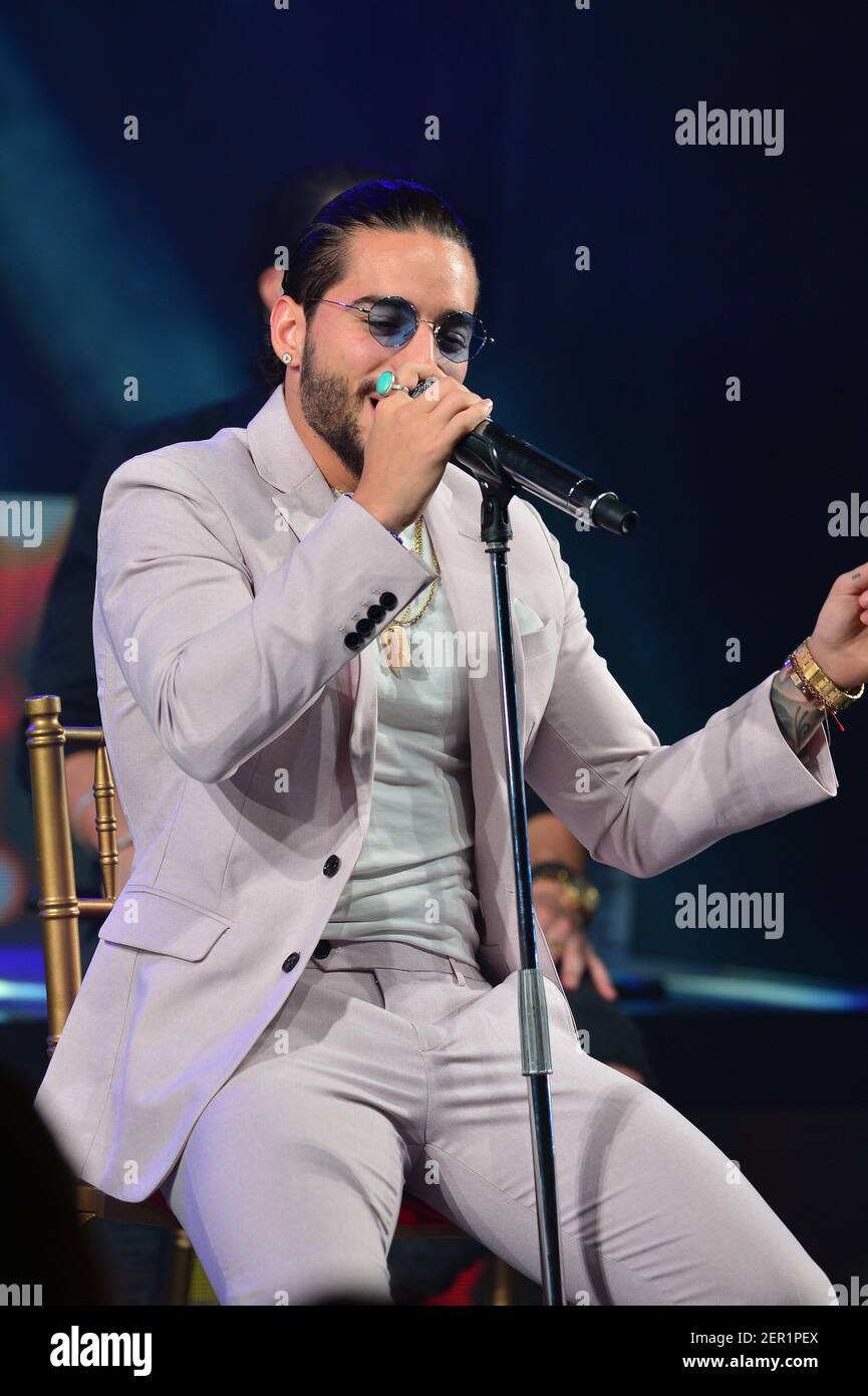 Maluma is seen during a performance and Q&A on stage during the ...