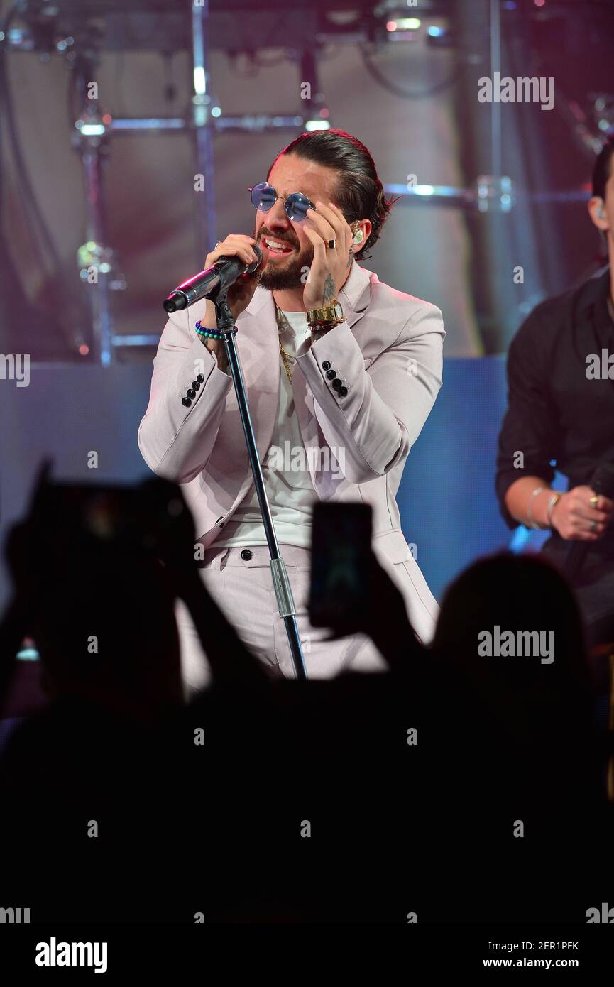 Maluma is seen during a performance and Q&A on stage during the ...