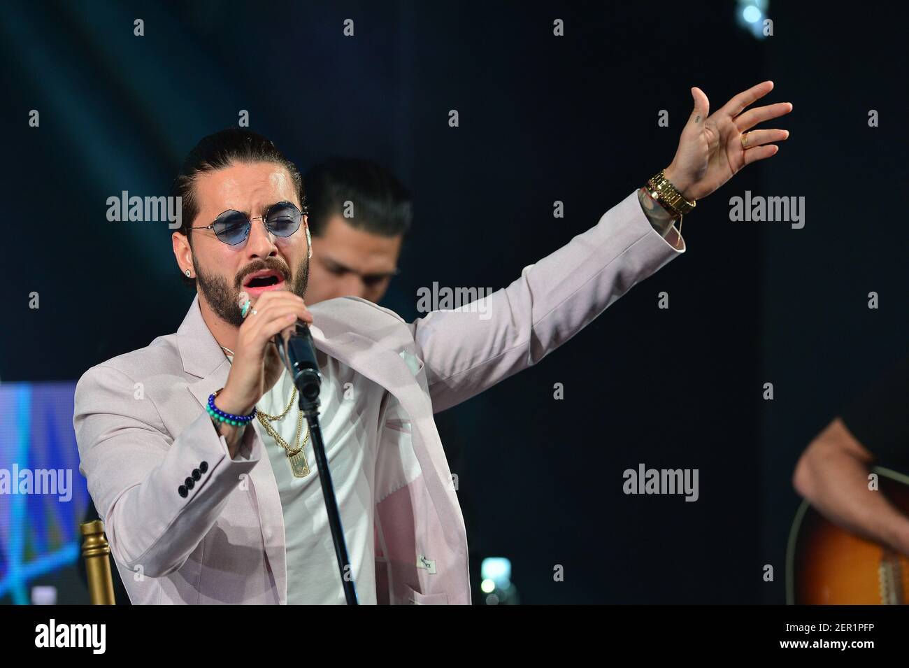 Maluma is seen during a performance and Q&A on stage during the ...