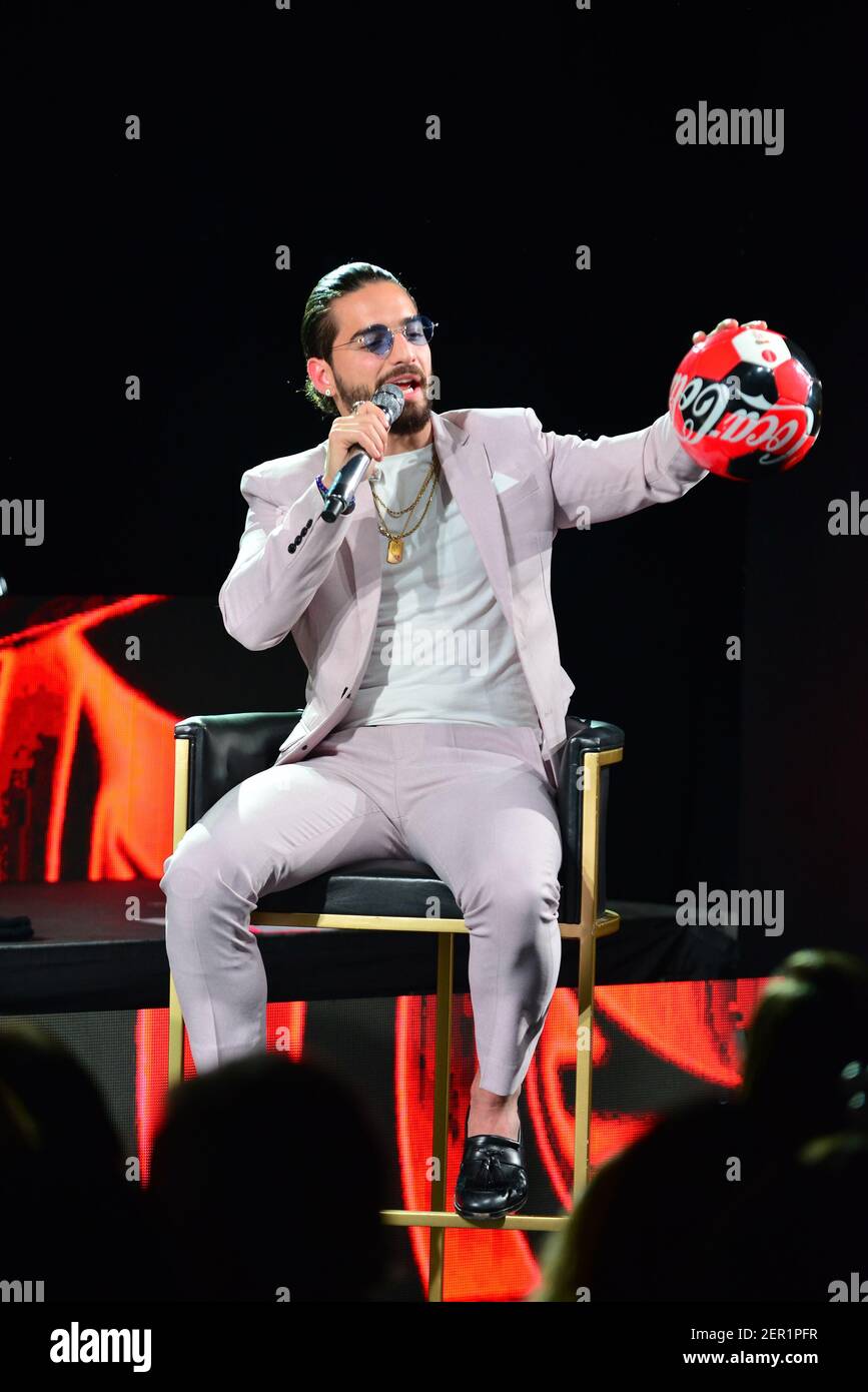 Maluma is seen during a performance and Q&A on stage during the ...