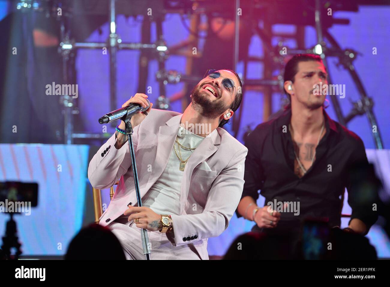 Maluma is seen during a performance and Q&A on stage during the ...