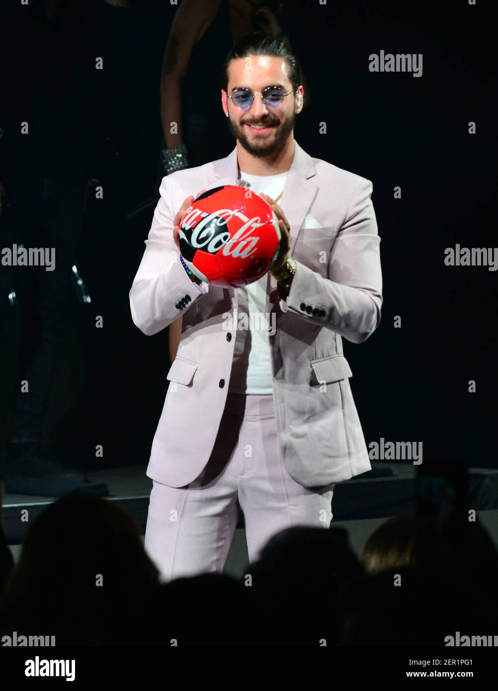 Maluma is seen during a performance and Q&A on stage during the ...