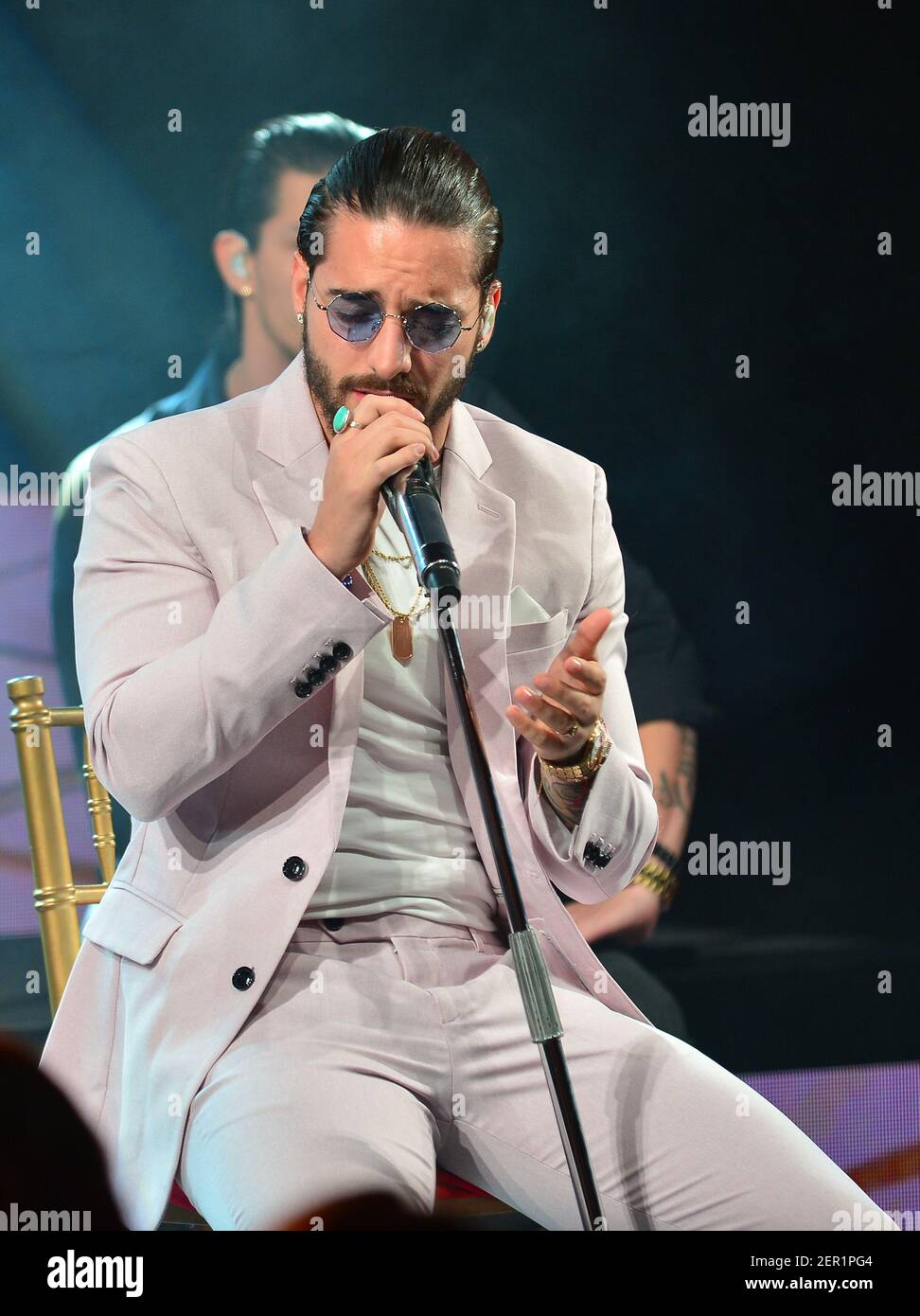 Maluma is seen during a performance and Q&A on stage during the ...