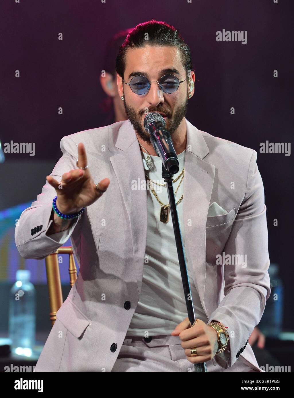 Maluma is seen during a performance and Q&A on stage during the ...