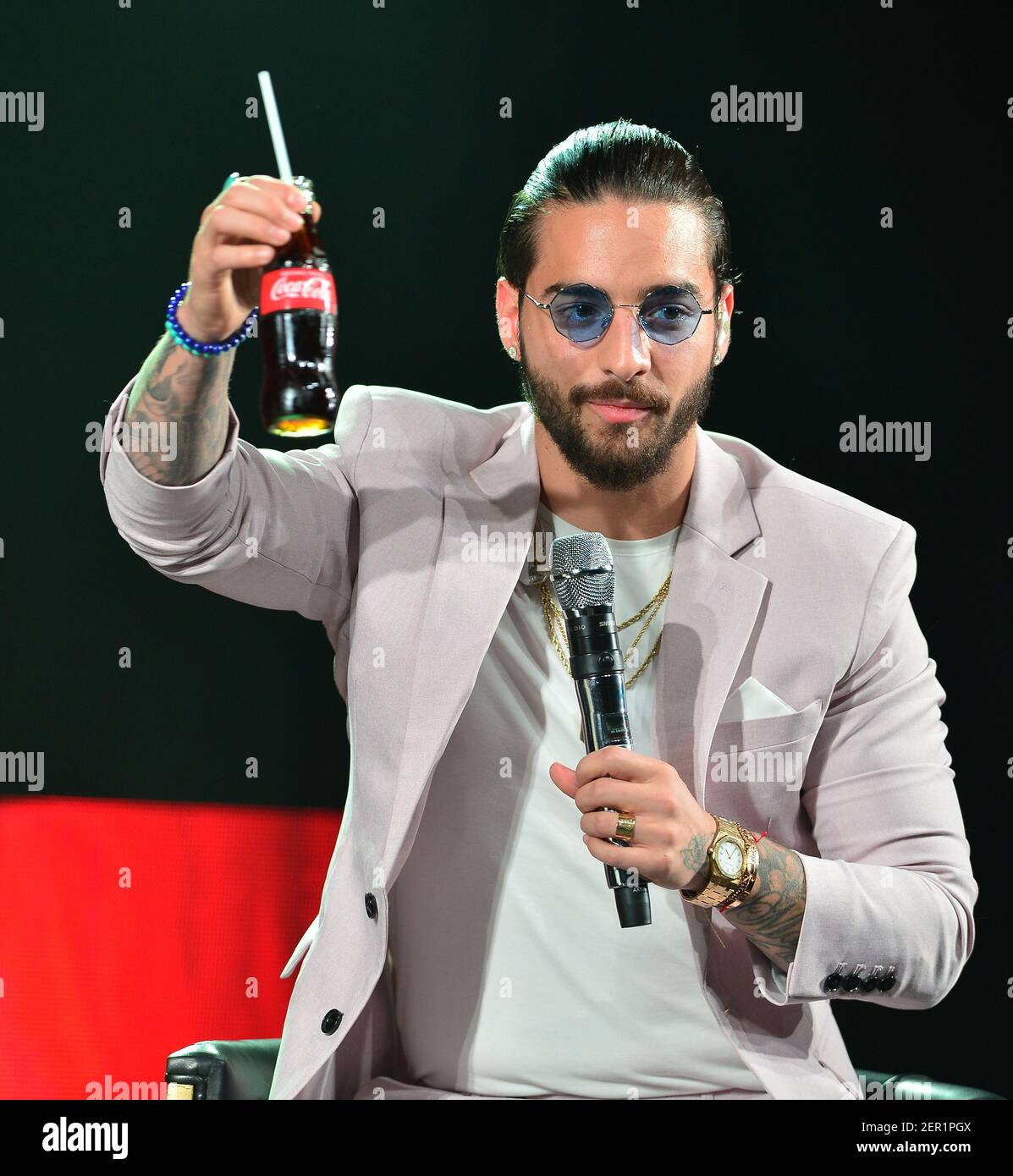 Maluma is seen during a performance and Q&A on stage during the ...