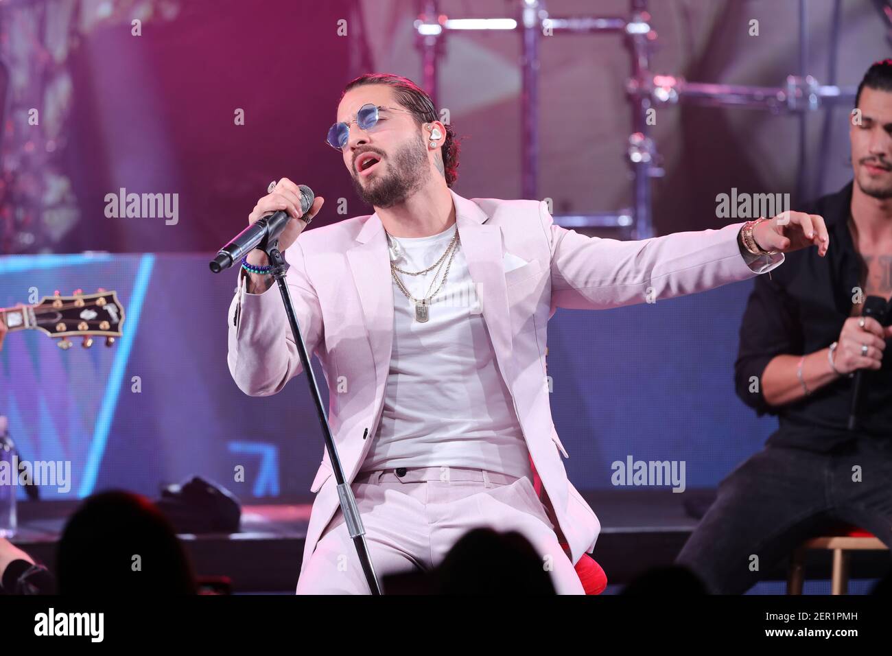 MIAMI BEACH, FL - MARCH 14: Maluma is seen on stage during the ...