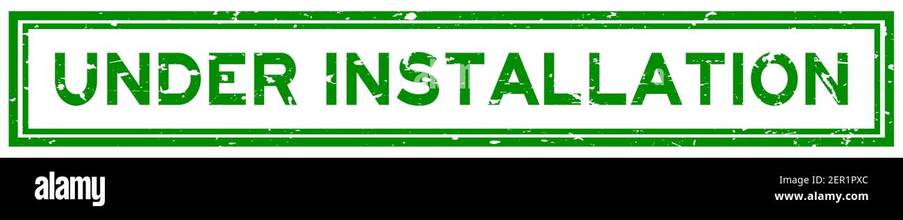 Grunge green under installation word square rubber seal stamp on white ...