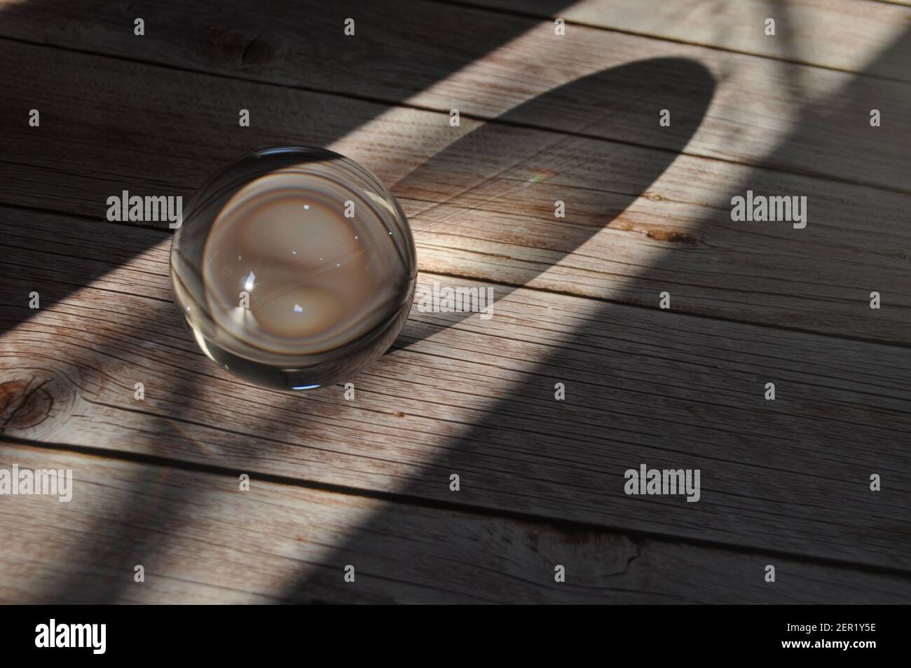 Crystal glass ball with brilliant lighting and luxurious background ...