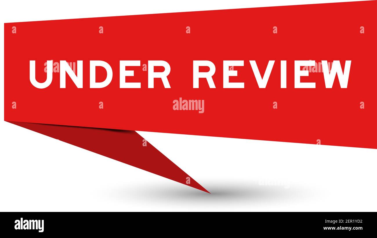 Paper speech banner with word under review in red color on white ...