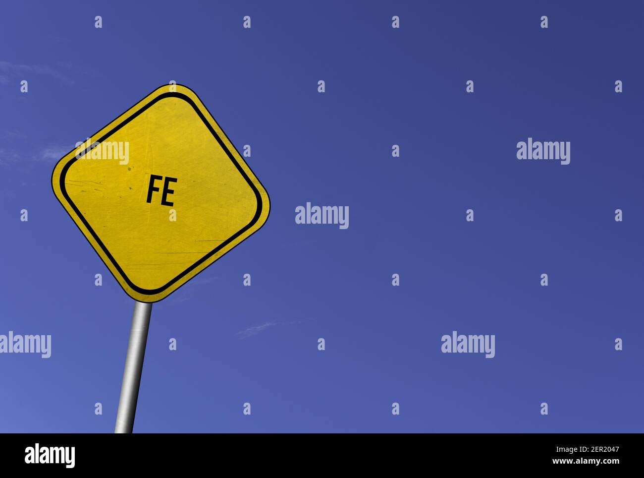 fe - yellow sign with blue sky background Stock Photo - Alamy