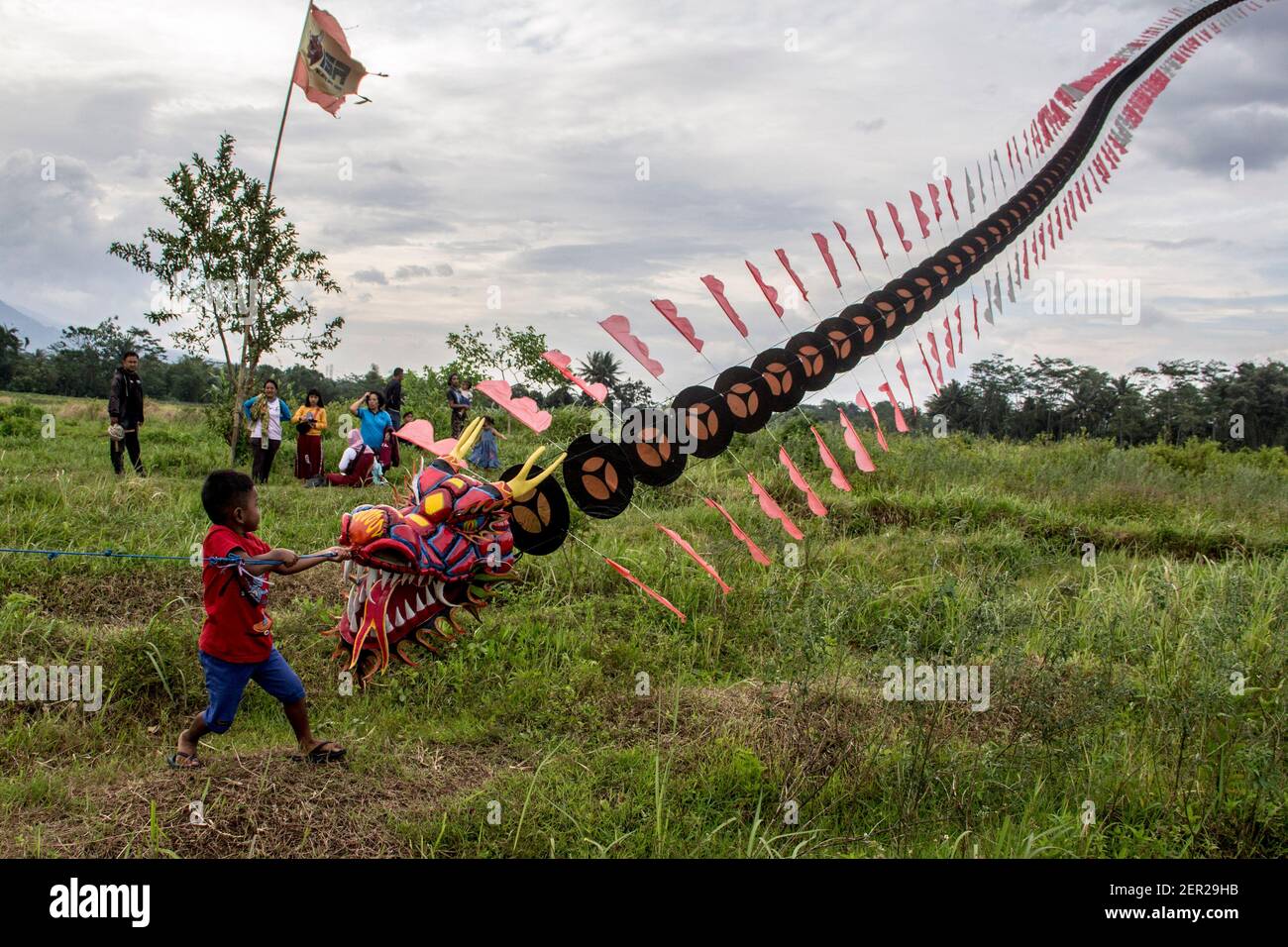 Child with kite indonesia hi-res stock photography and images - Alamy