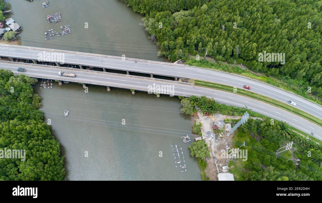 Aerial top view drone shot of bridge with cars on bridge highway road ...