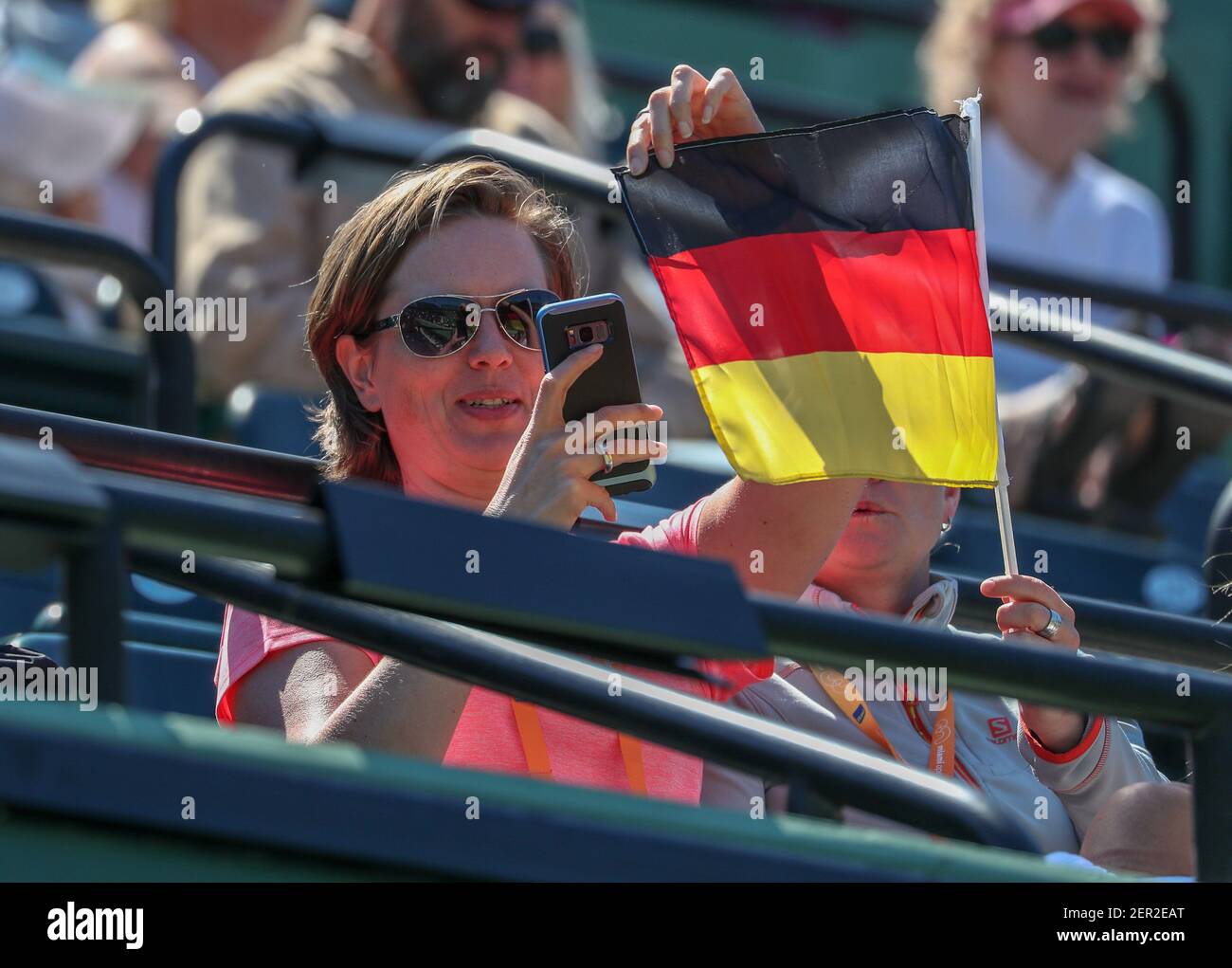 March 22, 2018: Miami Open fans take a selfie with the German flag ...