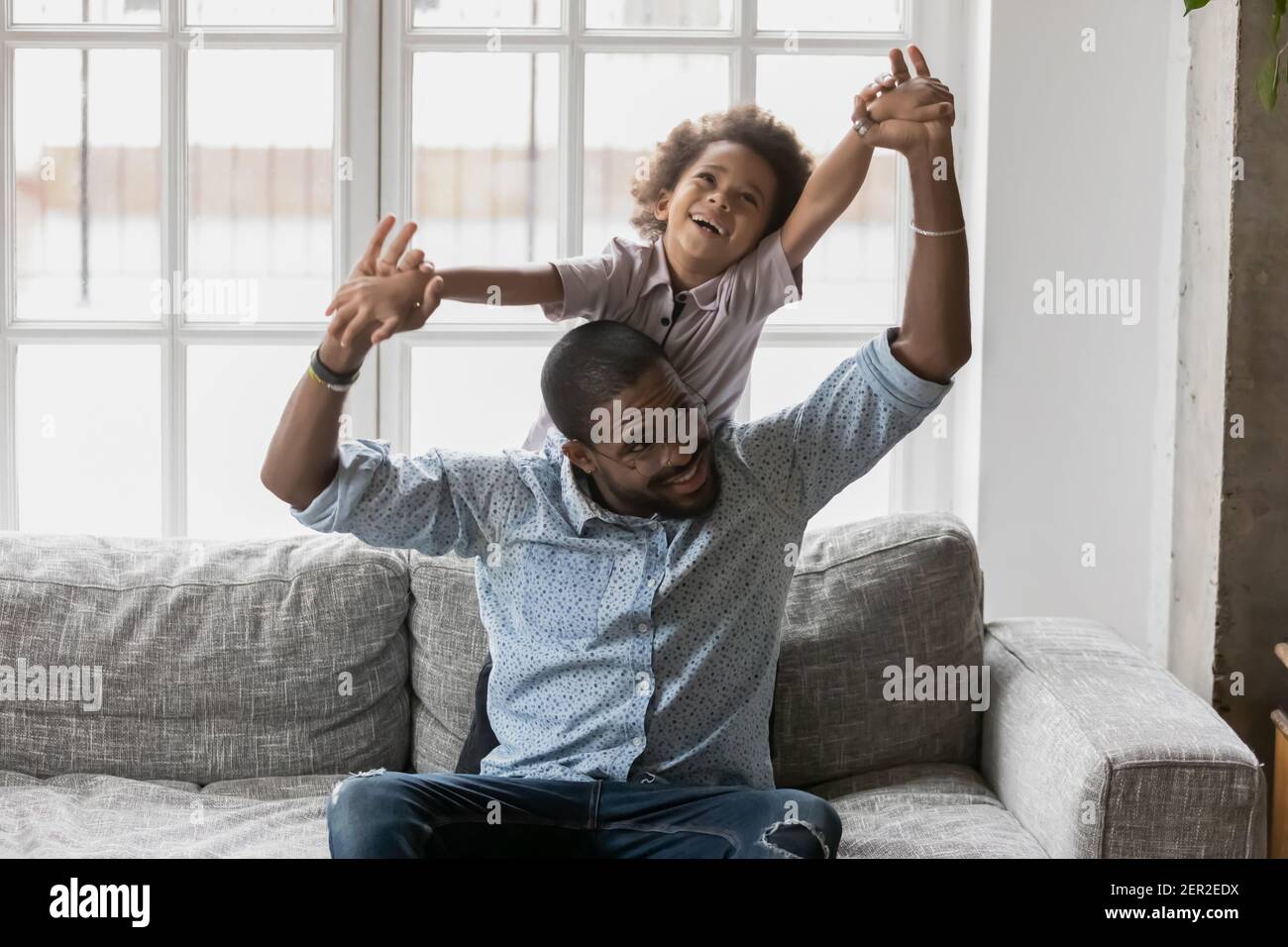 African american father son sitting hi-res stock photography and images ...