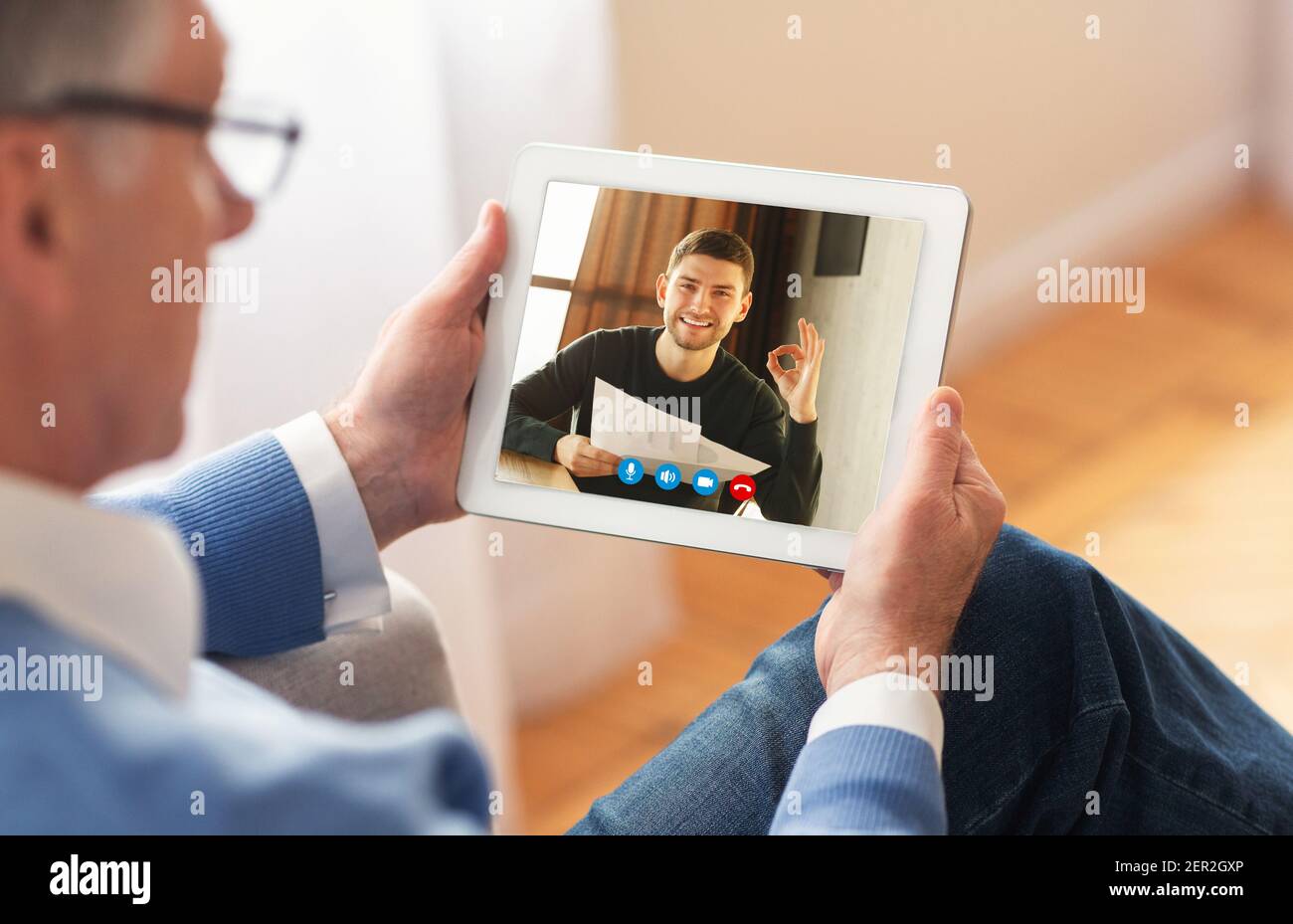 Man making video call with son using smartphone Stock Photo - Alamy