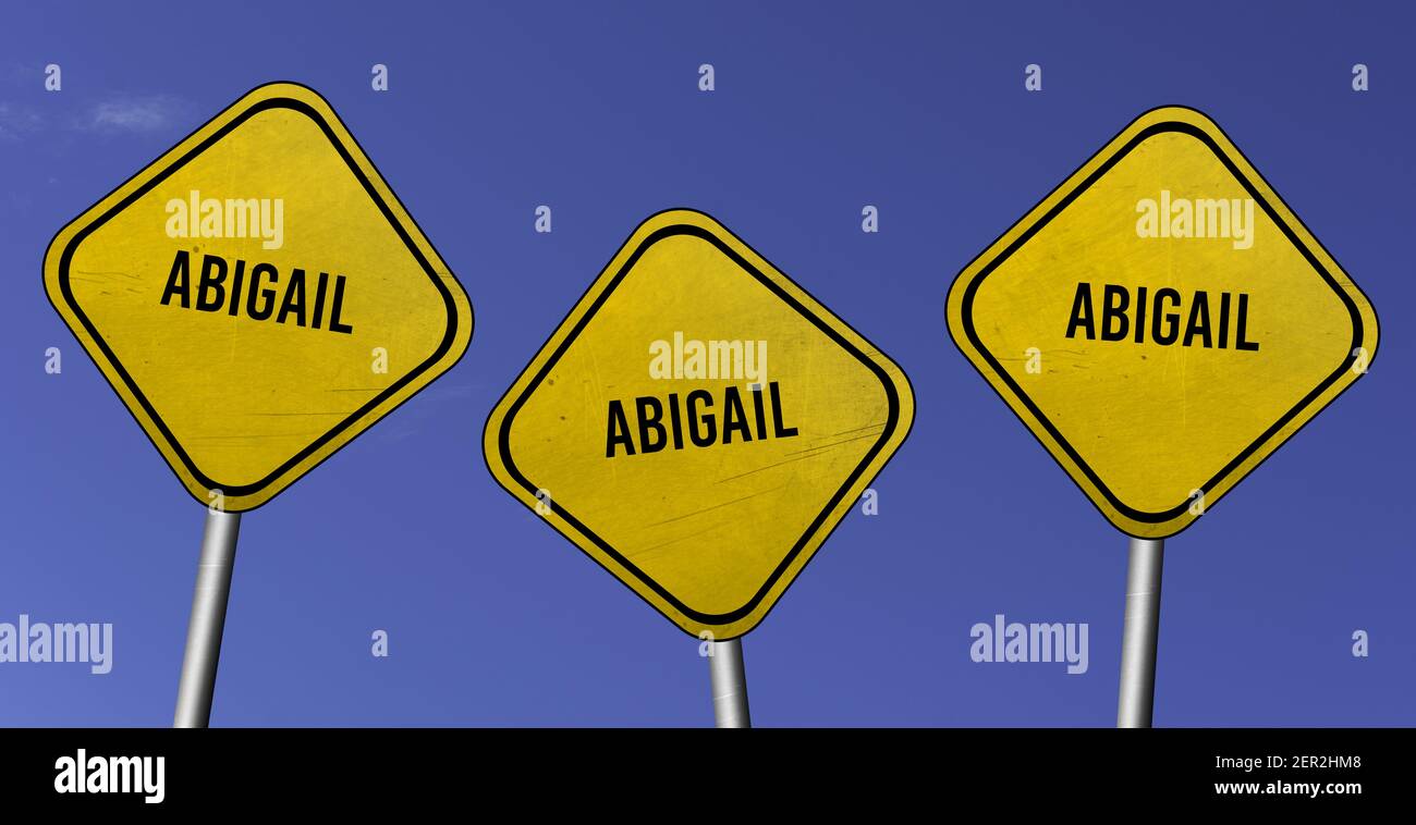Abigail - three yellow signs with blue sky background Stock Photo - Alamy