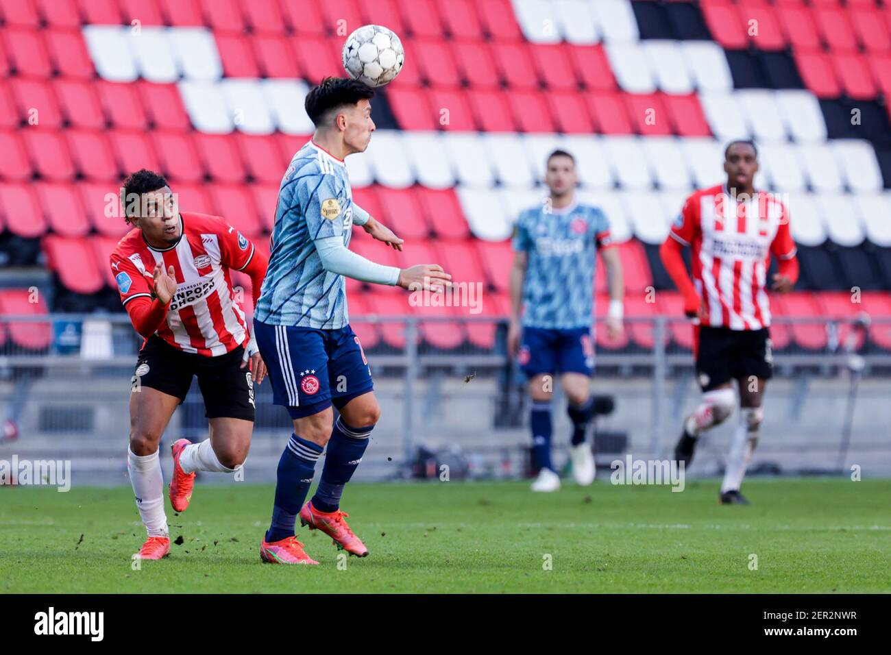 EINDHOVEN, NETHERLANDS - FEBRUARY 28: Donyell Malen of PSV and Lisandro ...