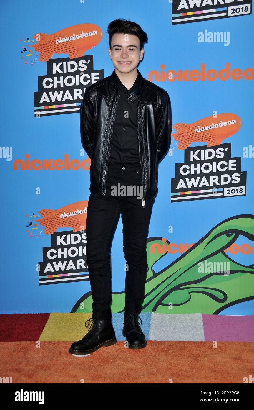 Luciano Spinelli walking on the red carpet during the 2018 Nickelodeon ...