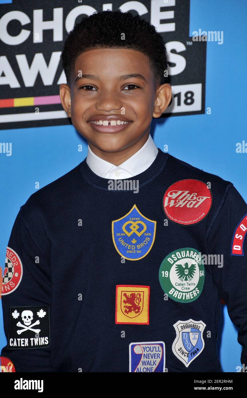 Lonnie Chavis walking on the red carpet during the 2018 Nickelodeon ...