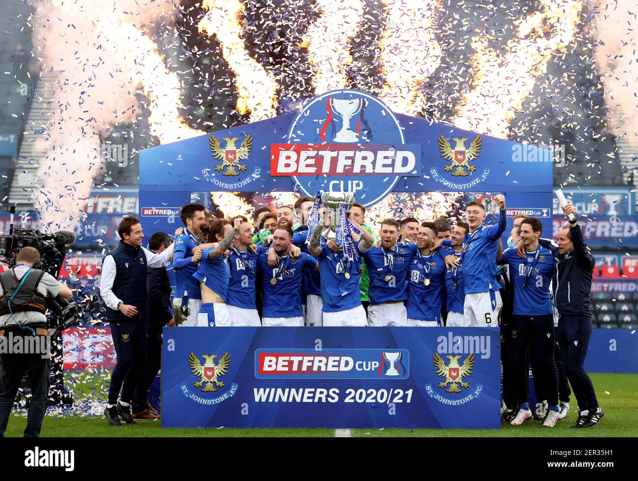St Johnstone players and staff members celebrate winning the Betfred ...