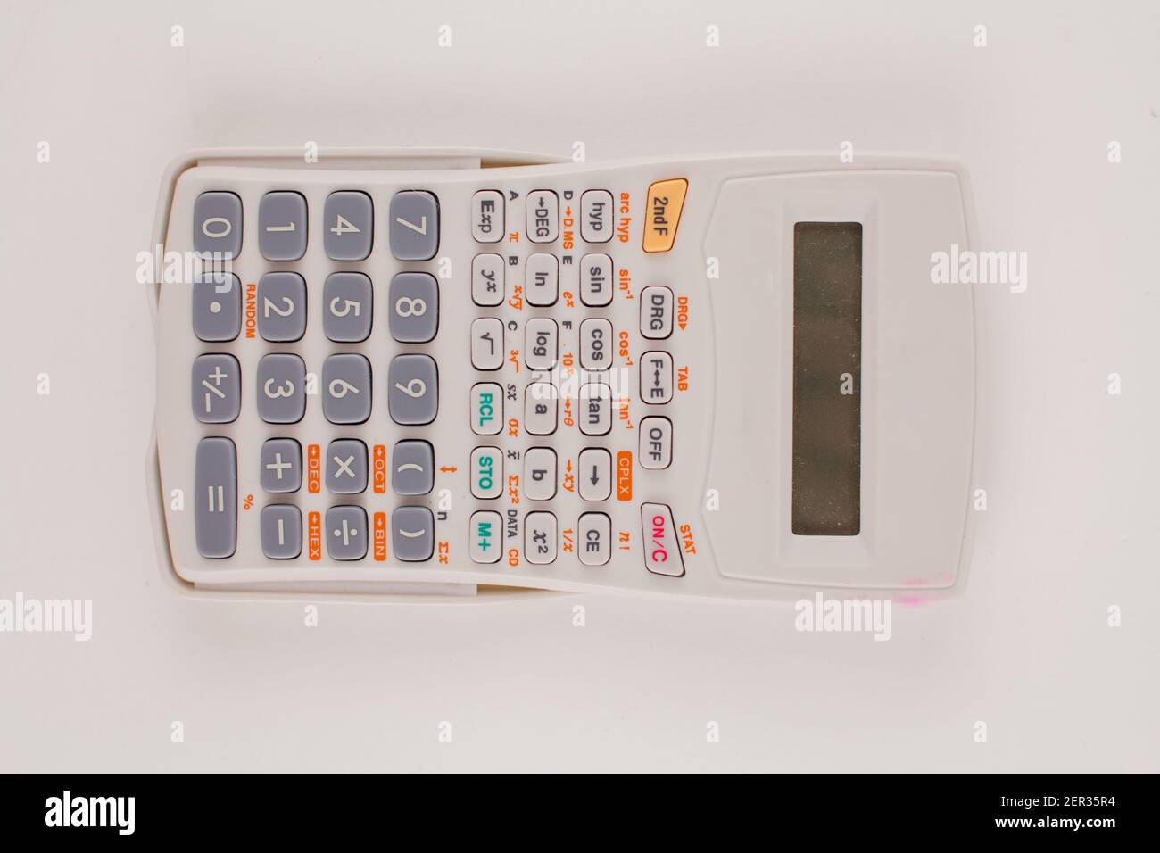 a large engineering calculator on white background Stock Photo - Alamy