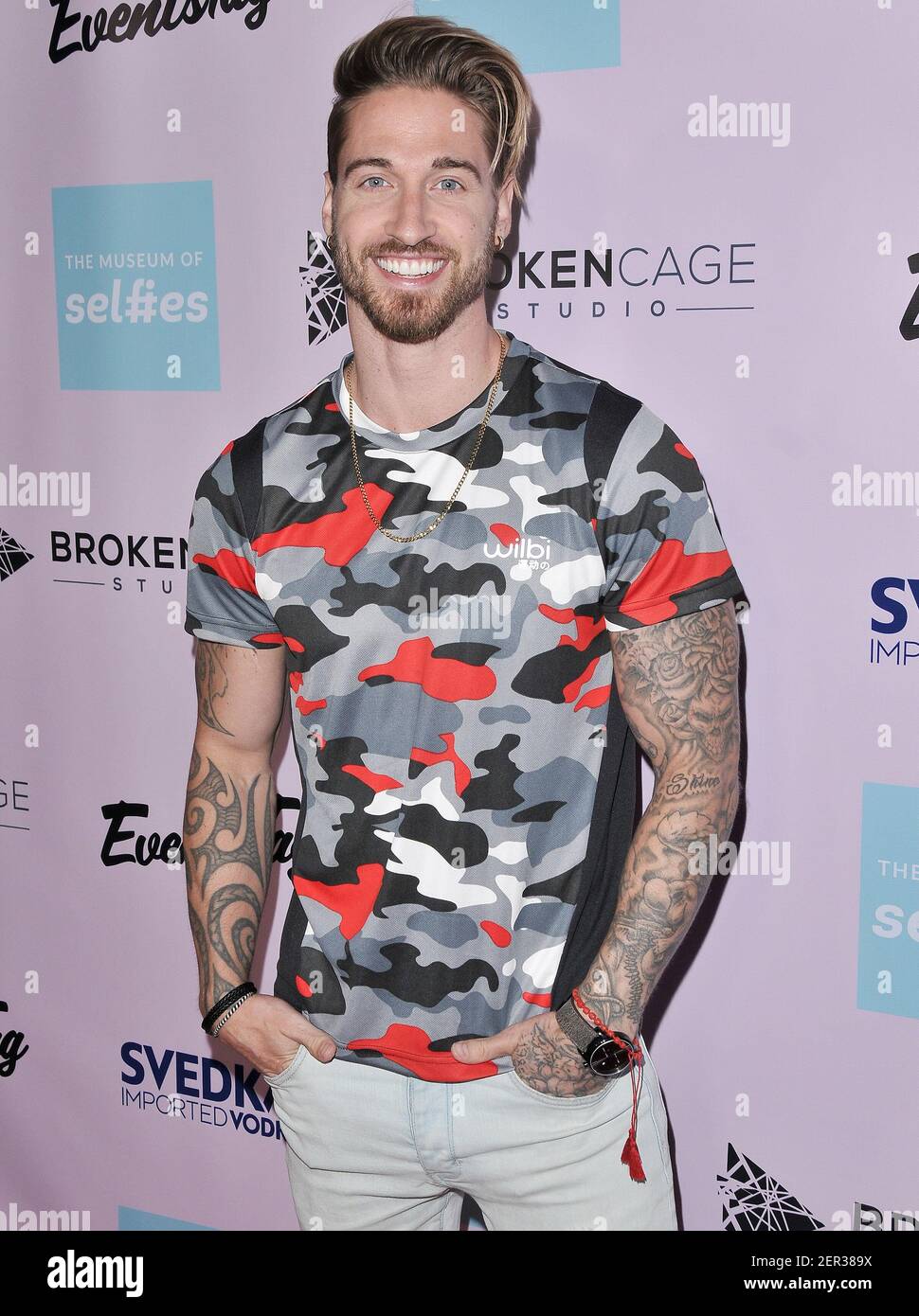 Travis Deslauier arrives at The Museum Of Selfies VIP Grand Opening ...