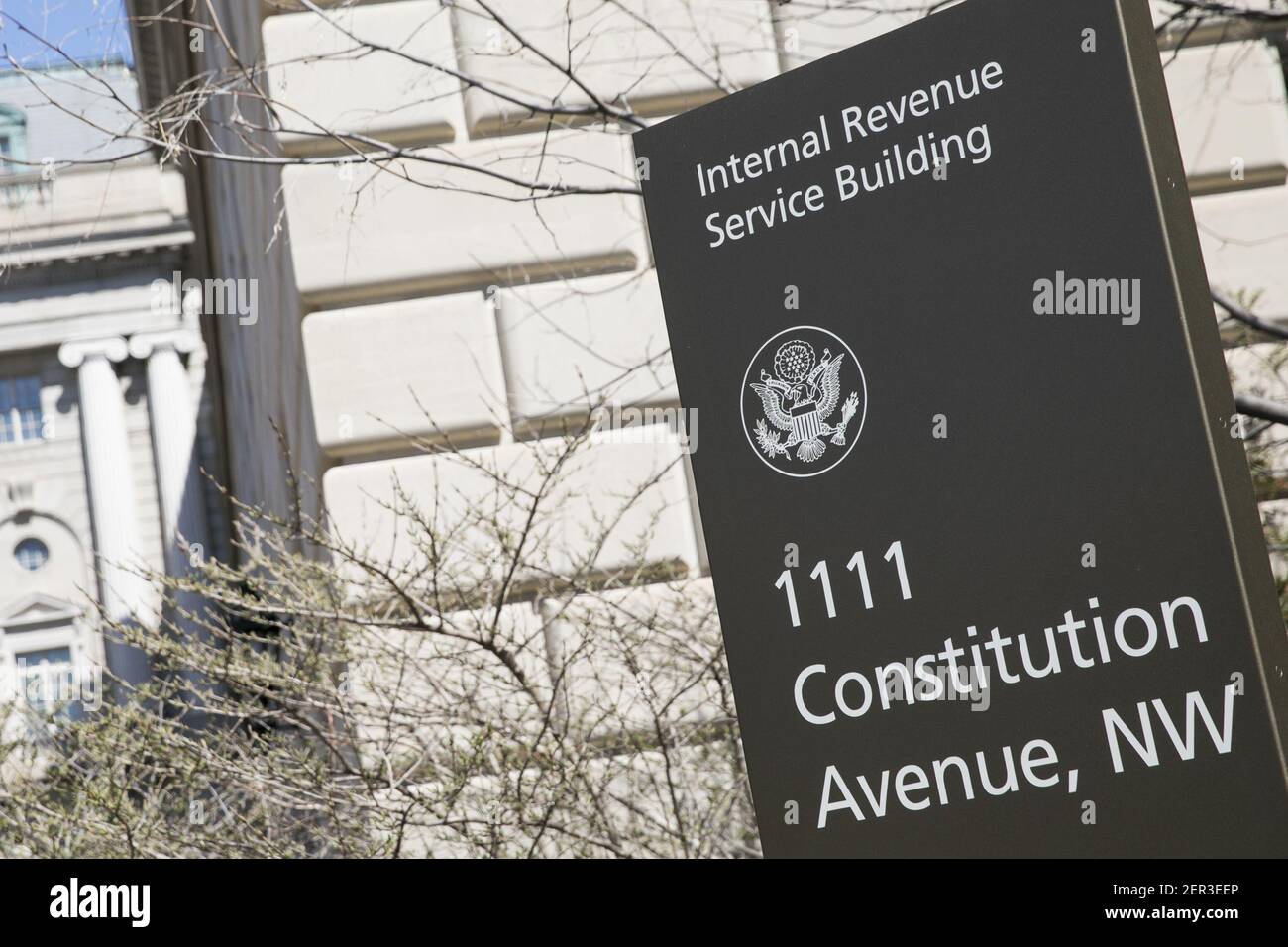 A logo sign outside of the headquarters of the Internal Revenue Service ...