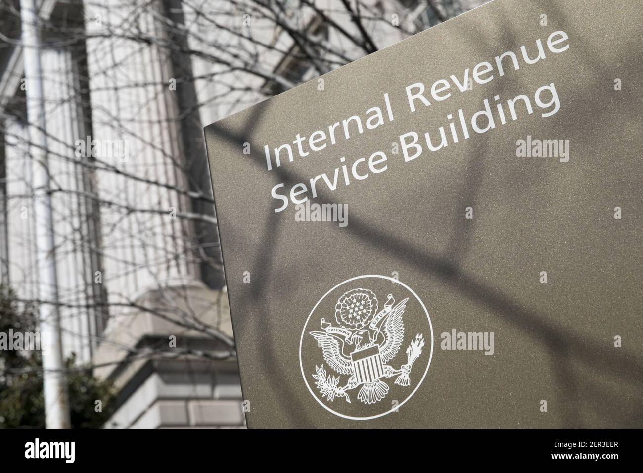 A logo sign outside of the headquarters of the Internal Revenue Service ...
