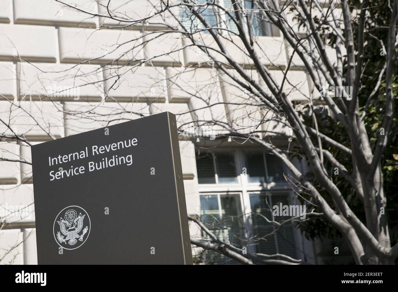 A logo sign outside of the headquarters of the Internal Revenue Service ...