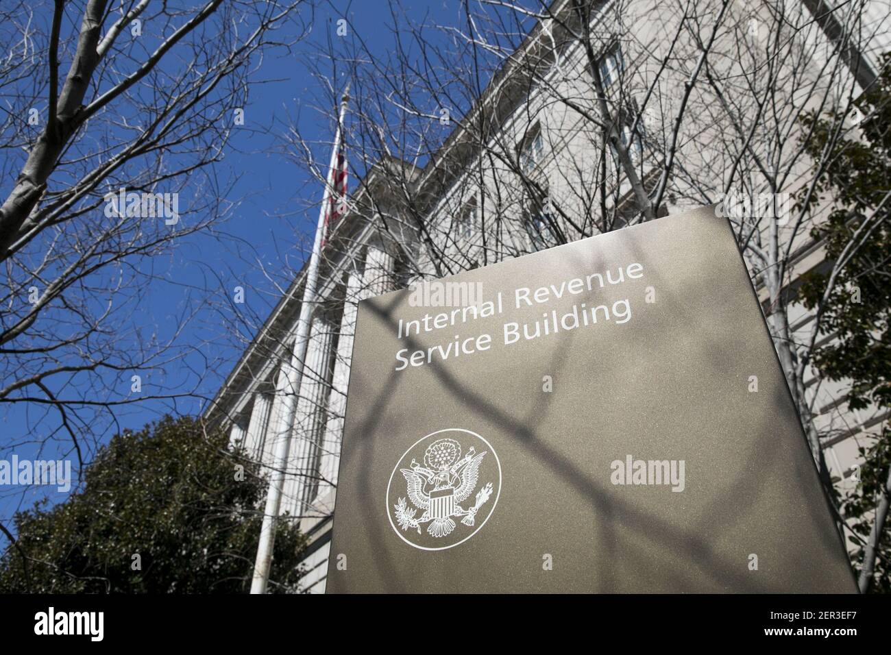 A logo sign outside of the headquarters of the Internal Revenue Service ...