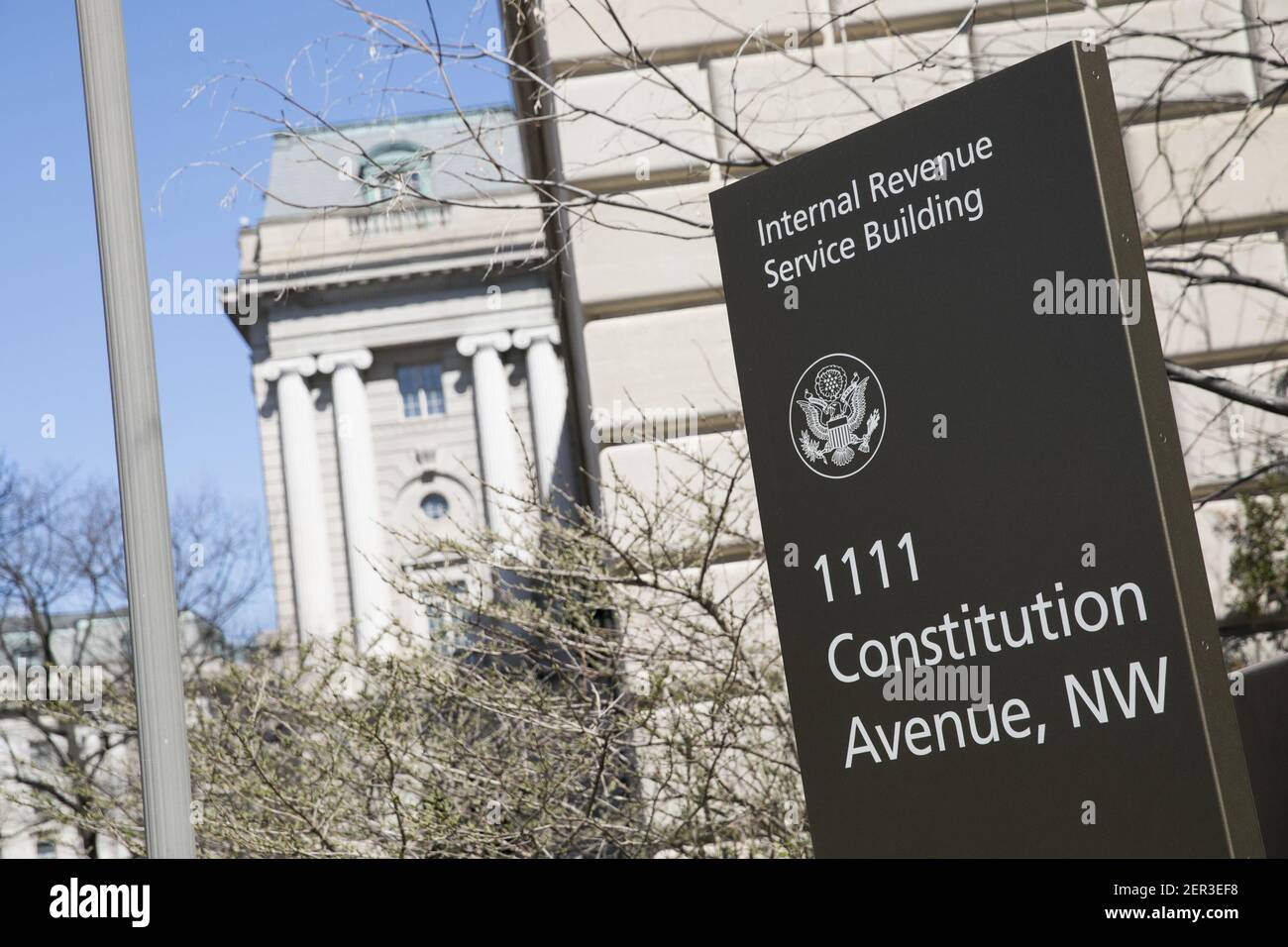 A logo sign outside of the headquarters of the Internal Revenue Service ...