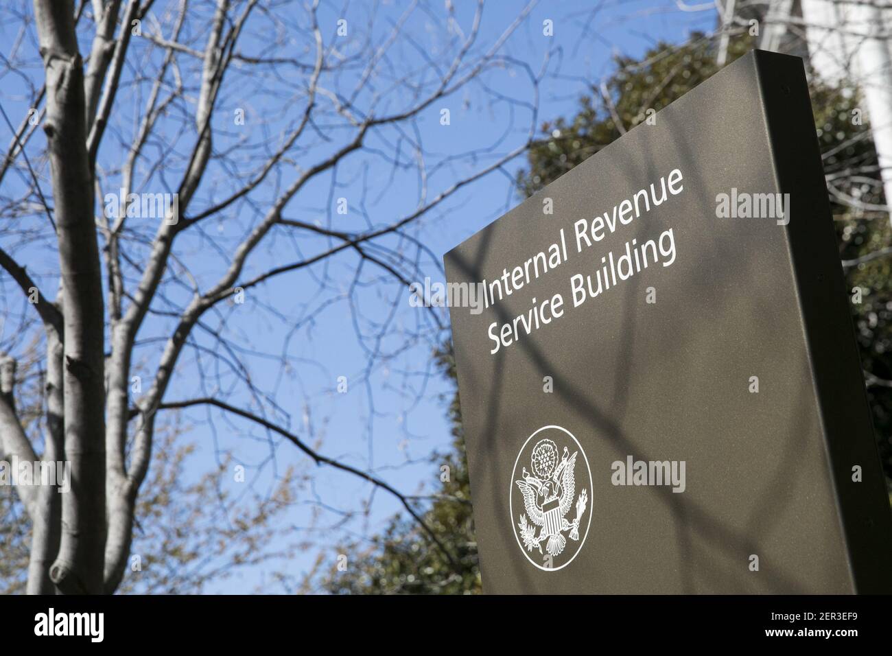A logo sign outside of the headquarters of the Internal Revenue Service ...