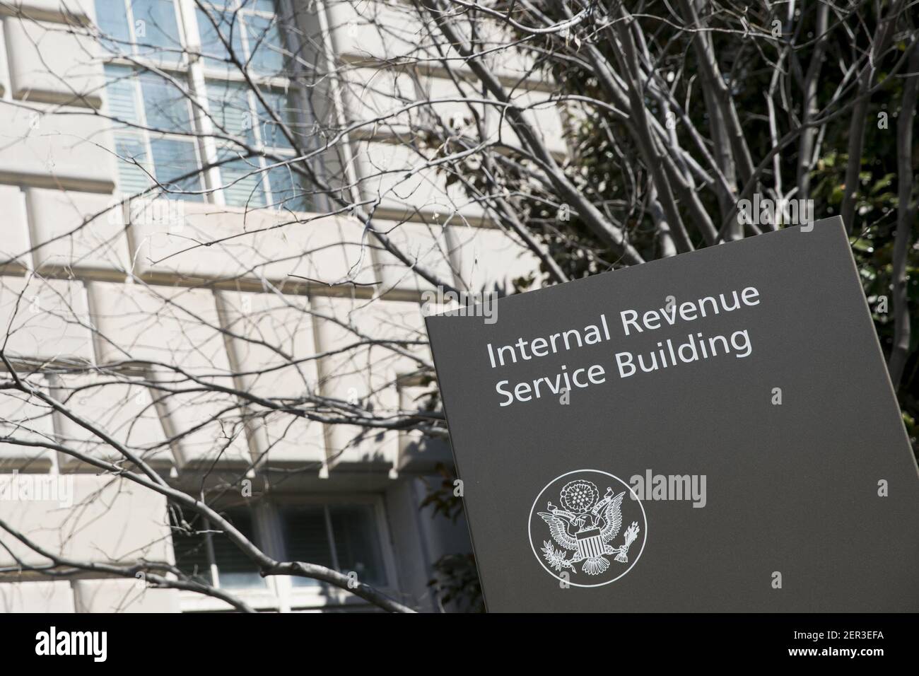 A logo sign outside of the headquarters of the Internal Revenue Service ...