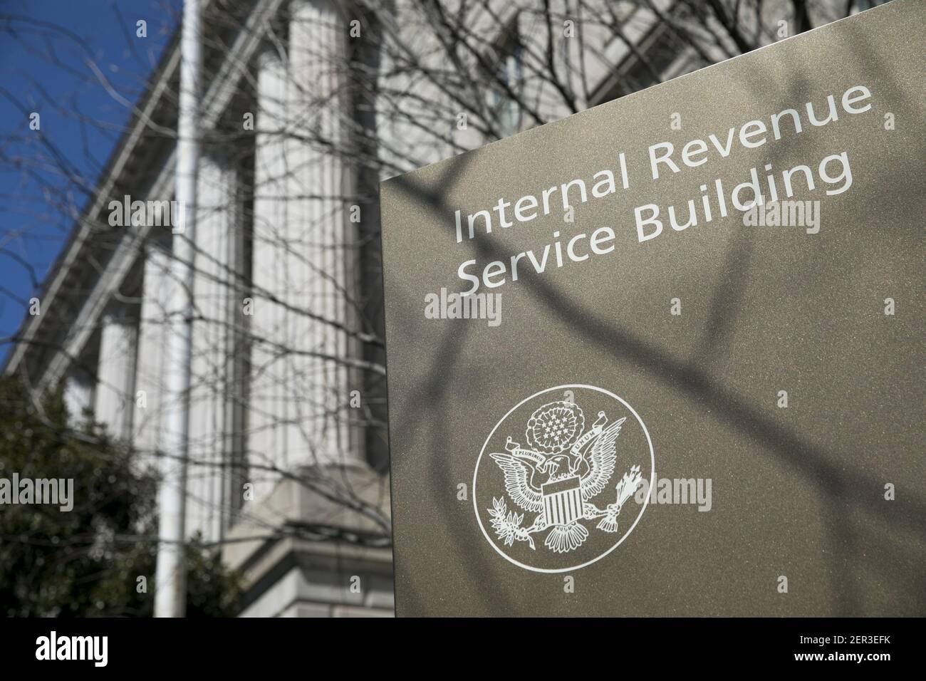 A logo sign outside of the headquarters of the Internal Revenue Service ...
