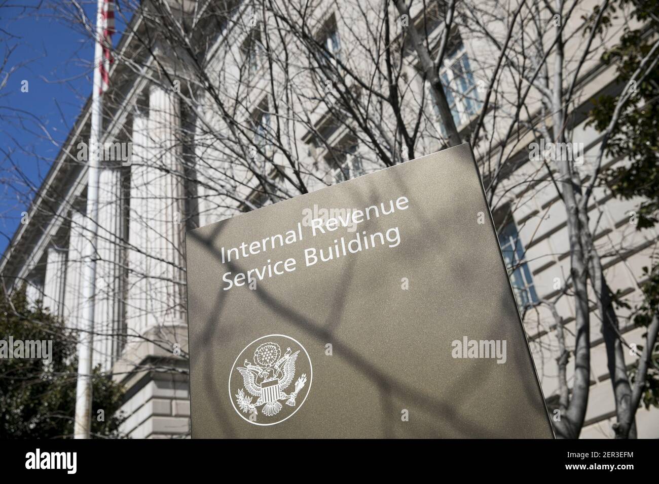 A logo sign outside of the headquarters of the Internal Revenue Service ...