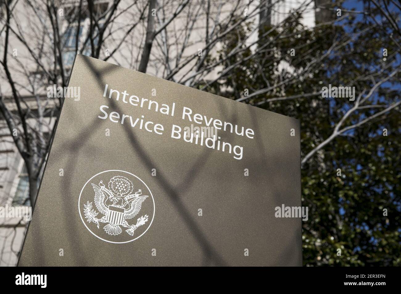 A logo sign outside of the headquarters of the Internal Revenue Service ...