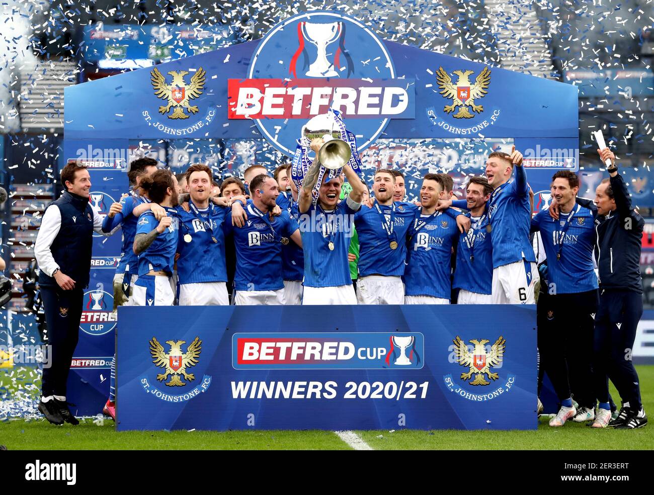 St Johnstone players and staff members celebrate winning the Betfred ...