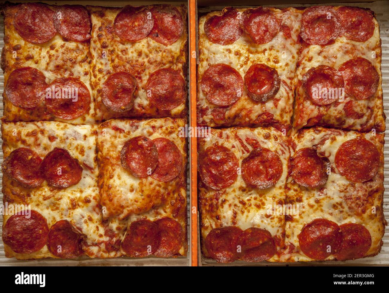 Pepperoni slices of Detroit style deep dish pizza, part of the Lunch ...