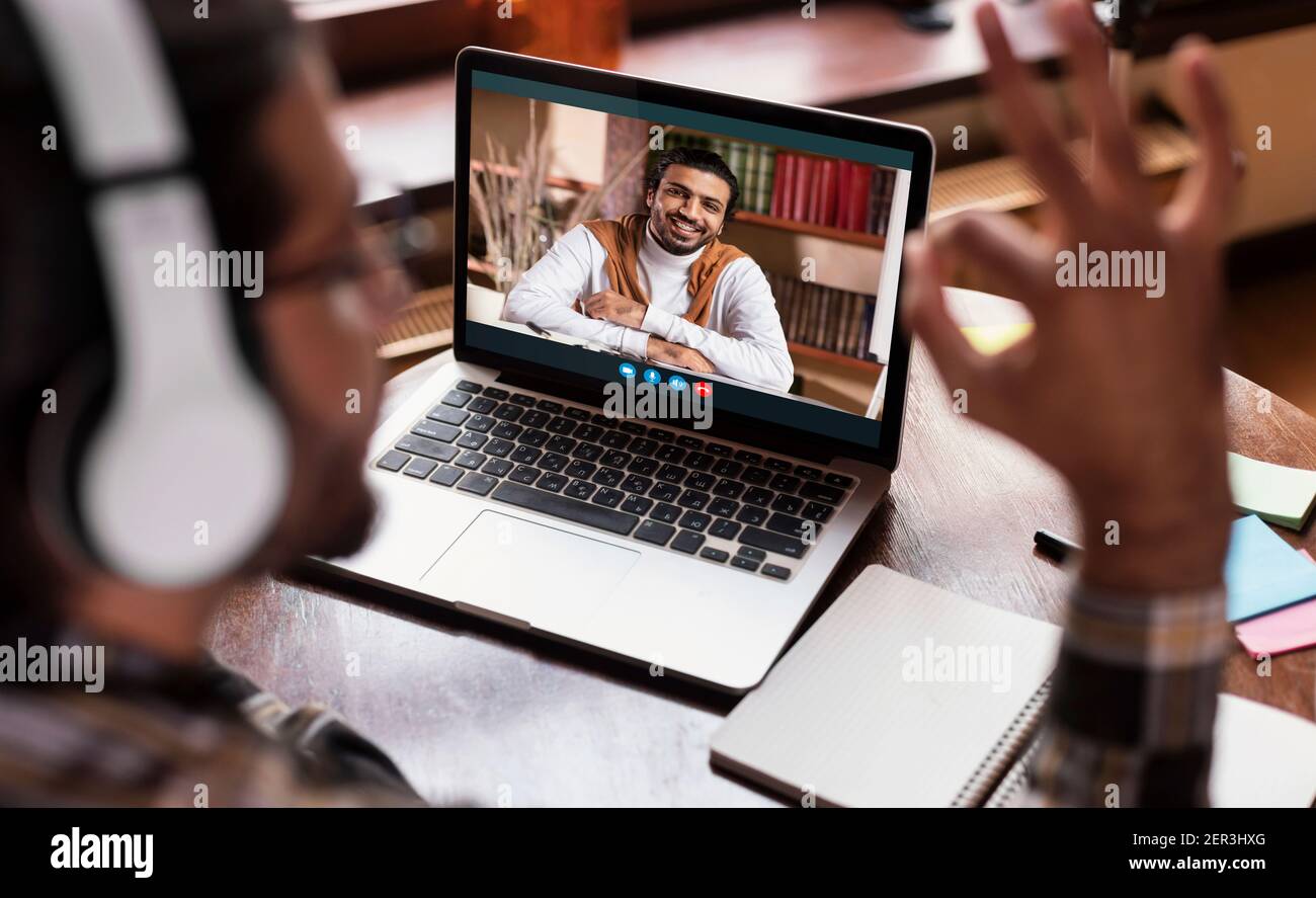 Student Showing Okay To Laptop Screen, Having Online Lesson Stock Photo ...