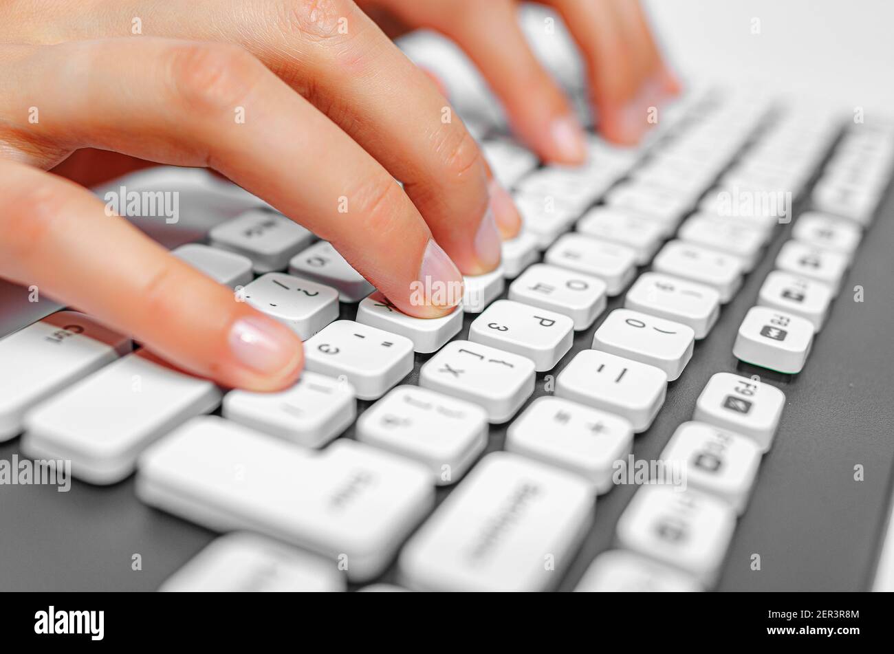 Female hands are typing on a computer or laptop keyboard Stock Photo ...