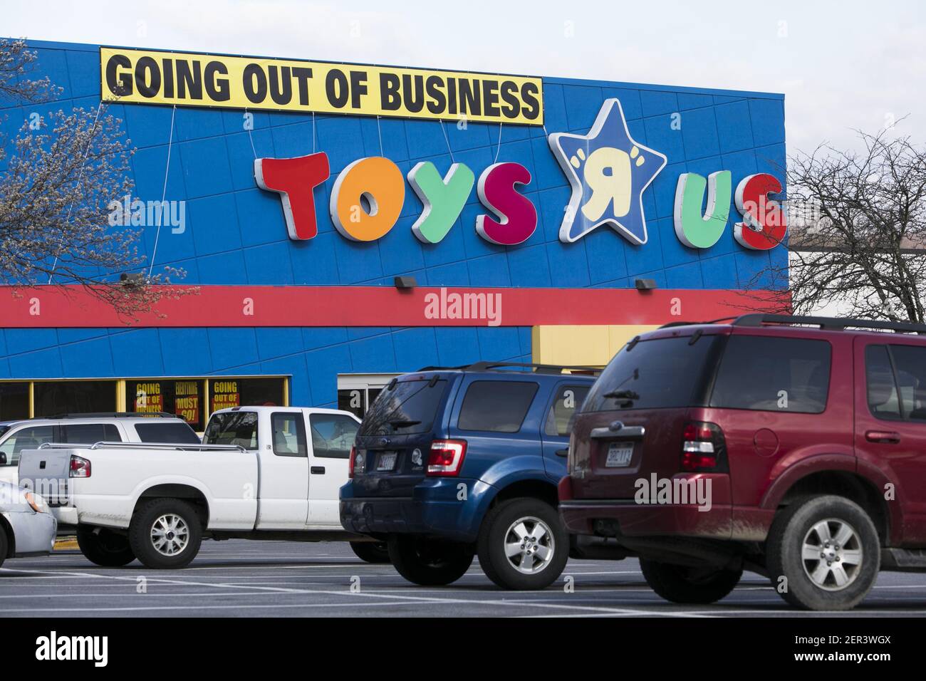 A logo sign outside of a Toys "R" Us retail store in Frederick ...