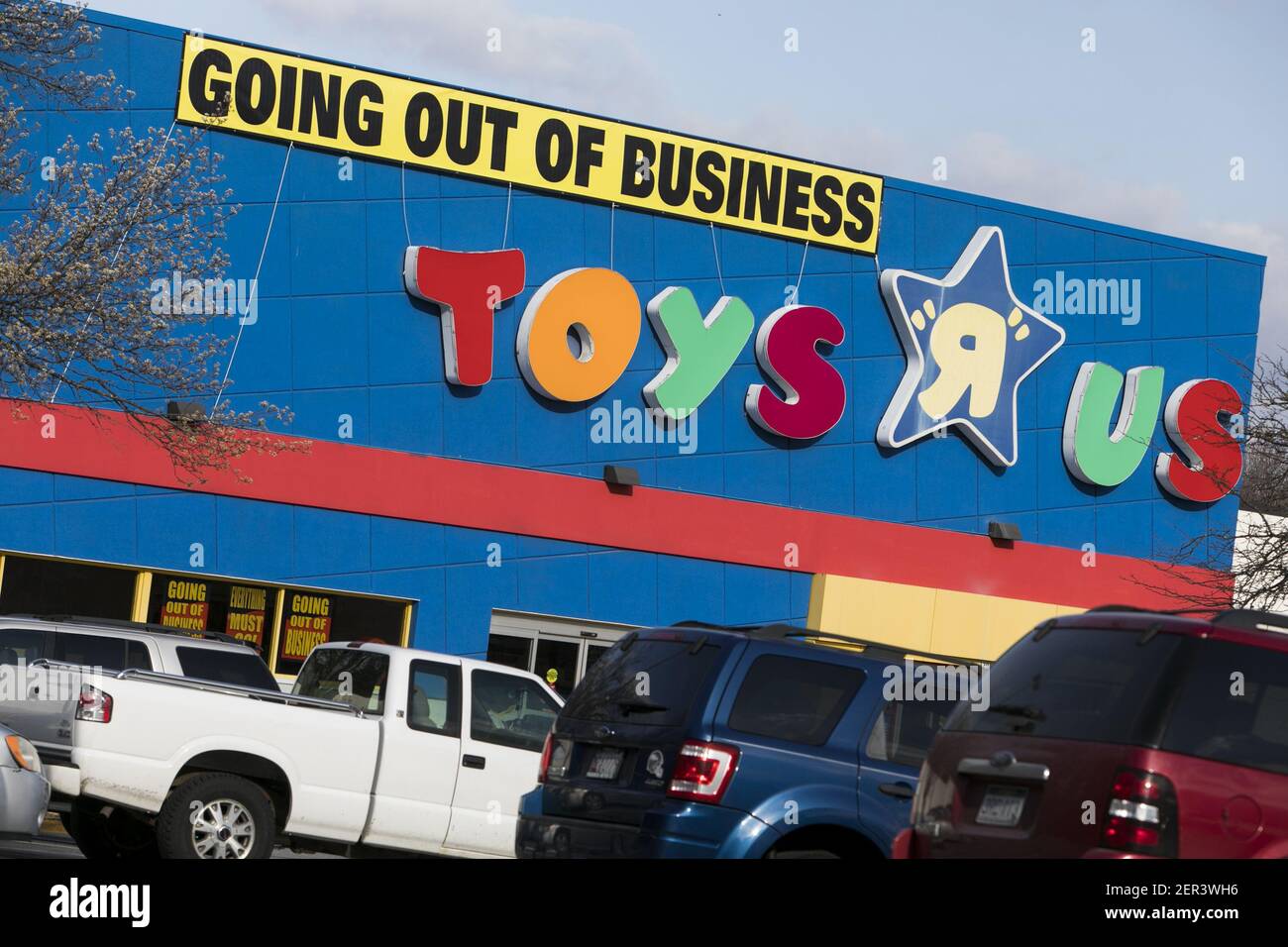 A logo sign outside of a Toys "R" Us retail store in Frederick ...