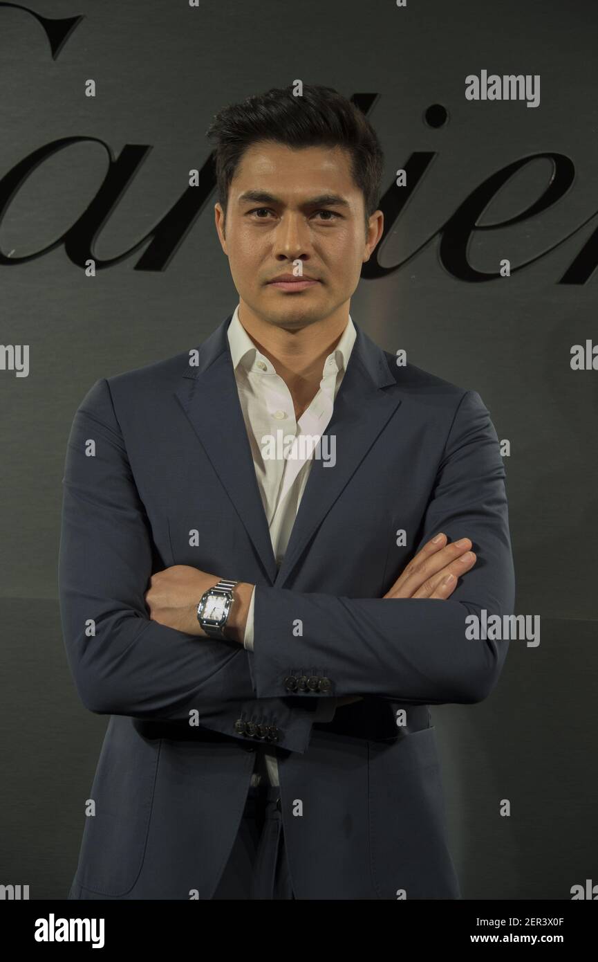 Henry Golding attends the launch event of Santos de Cartier watch at ...