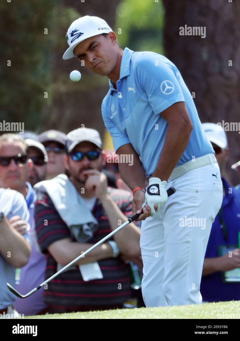 Rickie Fowler chips to the green on six during the second round of the ...