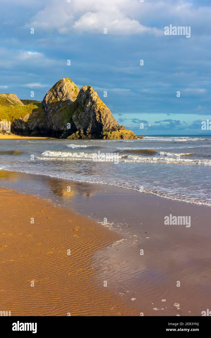 View of the sandy beach at Three Cliffs Bay on the south coast of the ...