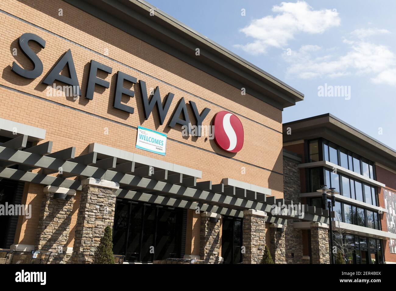 A logo sign outside of a Safeway grocery retail store location in Olney ...
