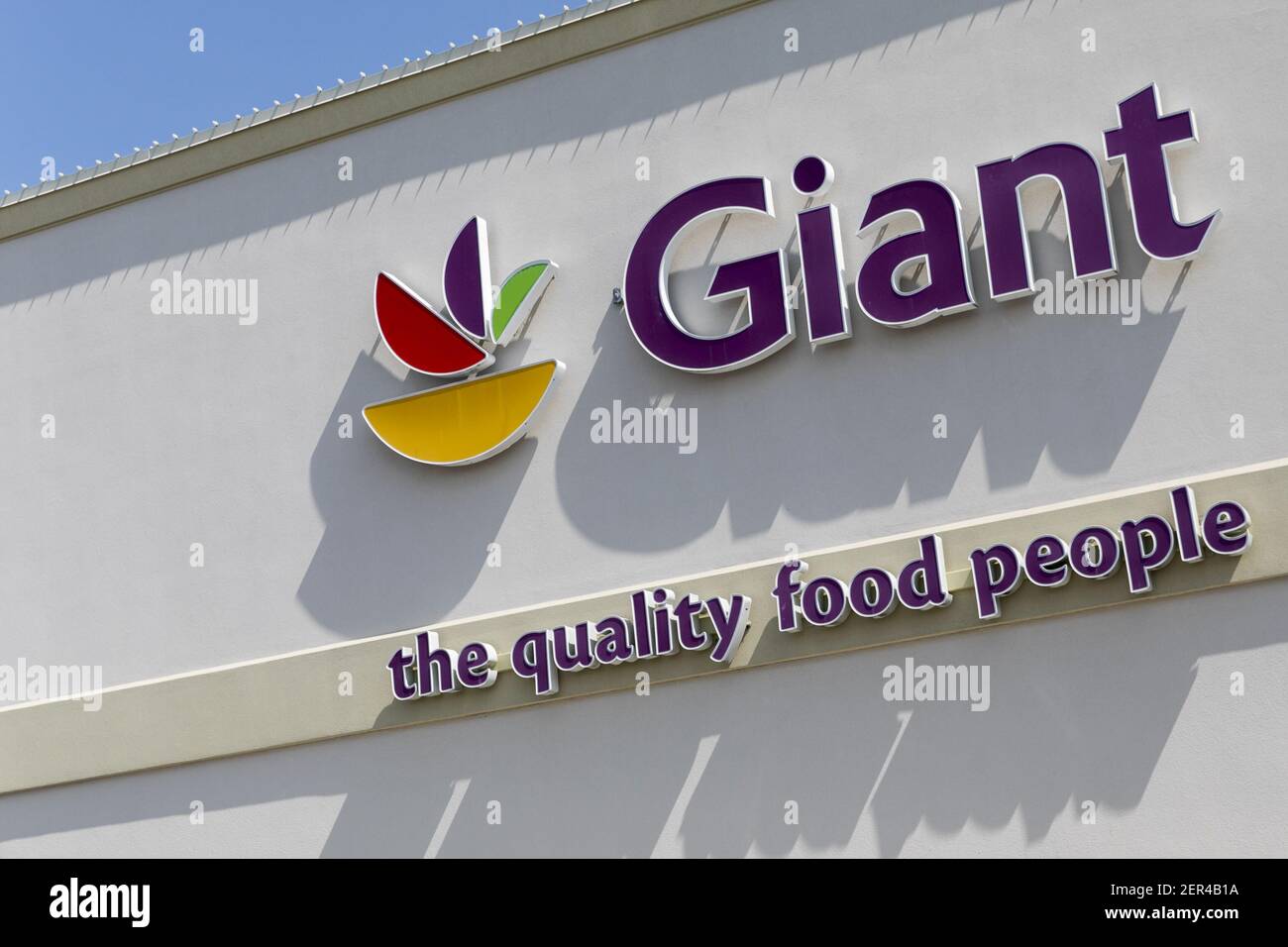 A logo sign outside of a Giant Food grocery retail store location in ...